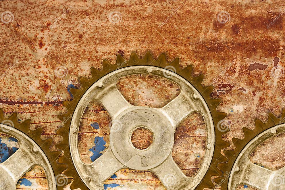 Ancient Cog Wheels Against a Rusty Background Stock Photo - Image of ...