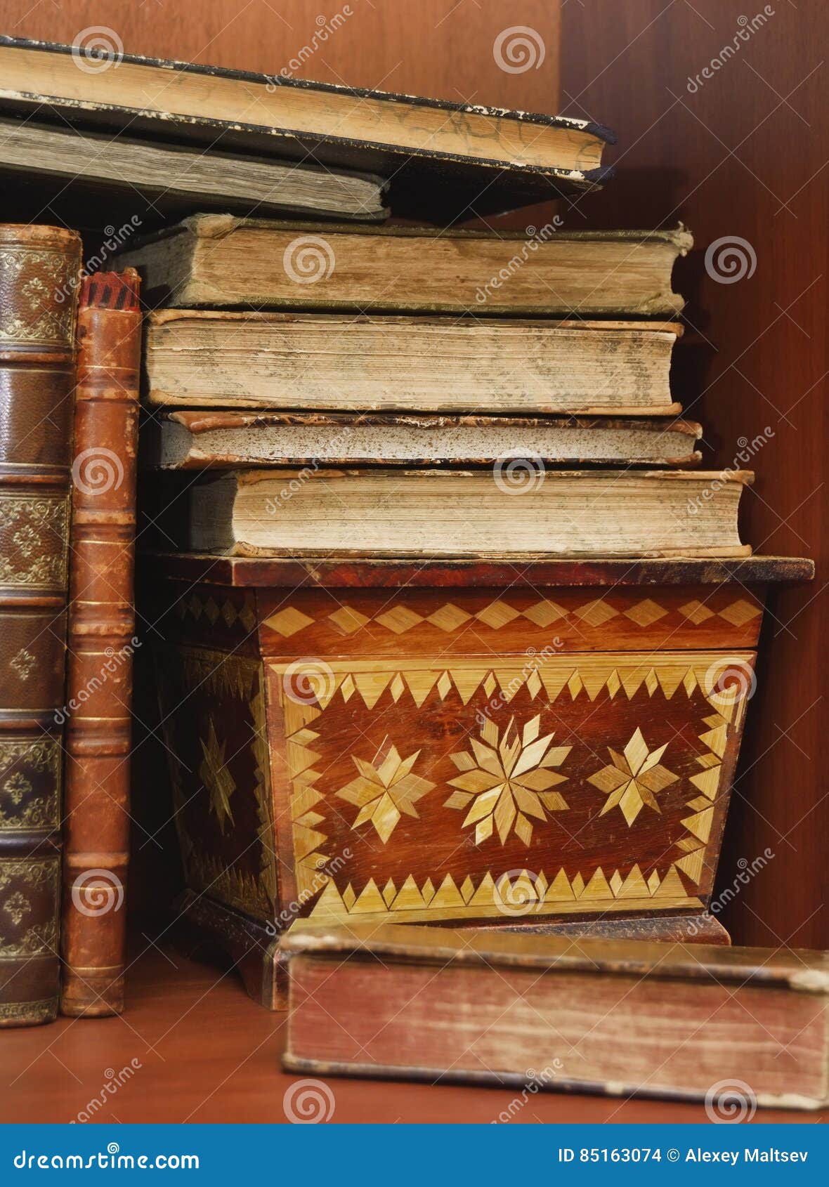 Ancient corner in bookcase stock photo. Image of table - 85163074