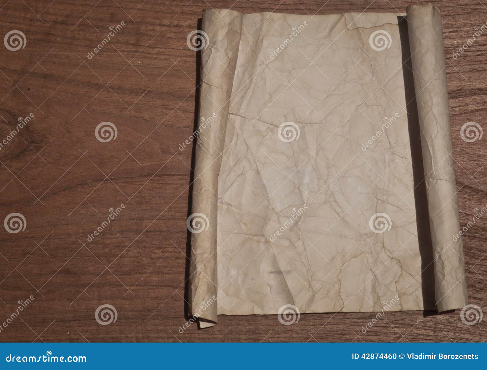 Ancient Crumpled Paper Scroll on Wood Table for Background Stock Photo ...