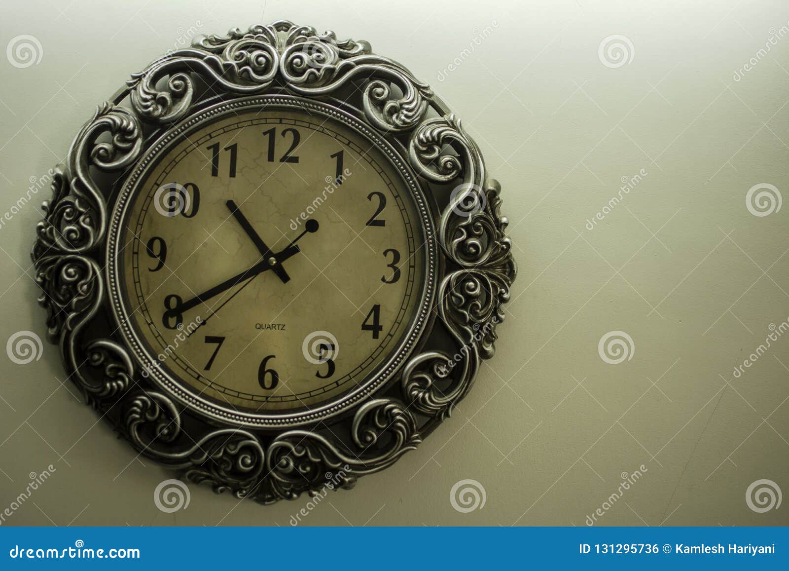 Ancient Designer Wall Clock with Light Yellow Back Ground Showing Time ...