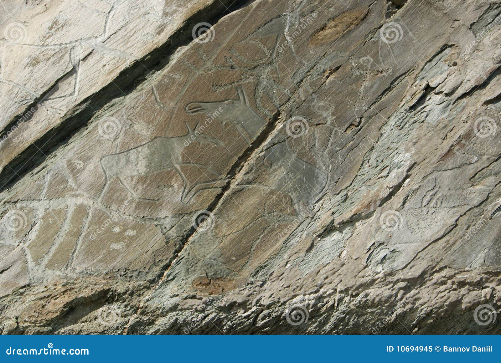Ancient Drawings Carved on the Rocks Stock Image - Image of boulders ...