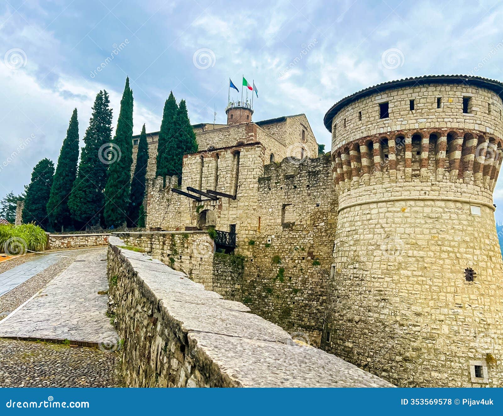 Ancient European Castle with Round Tower and Walkway Along the Top of ...