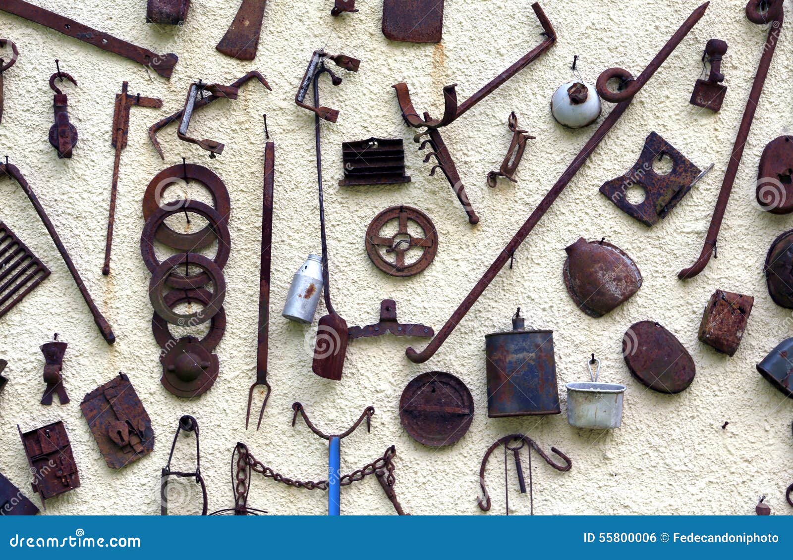 Ancient Farming Tools Hanging on the Wall of the Rural House Stock ...
