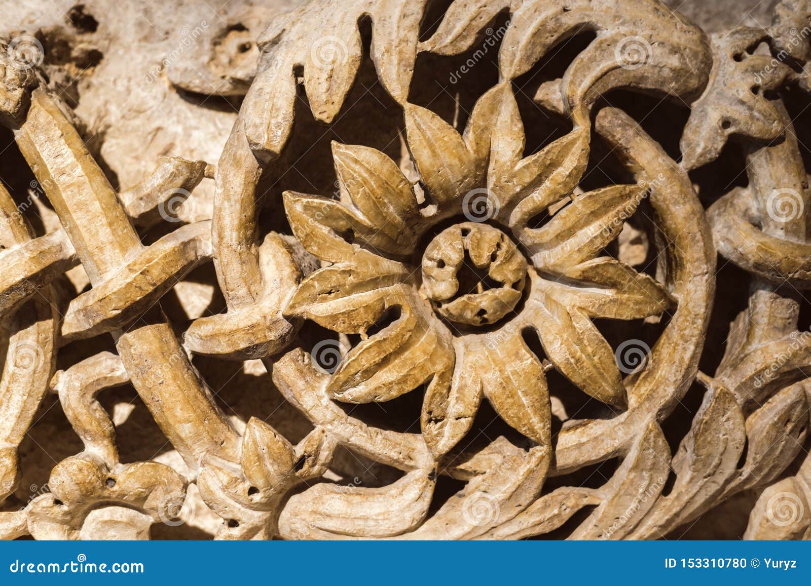 Ancient flower sculpture stock photo. Image of stone - 153310780
