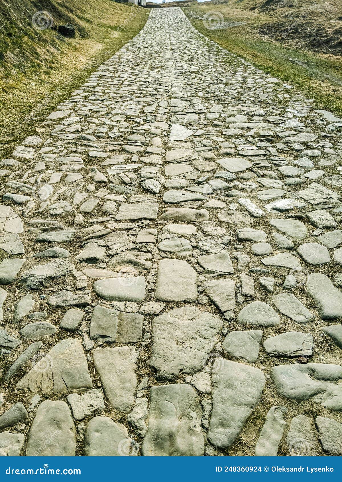Ancient granite paved road stock photo. Image of paving - 248360924