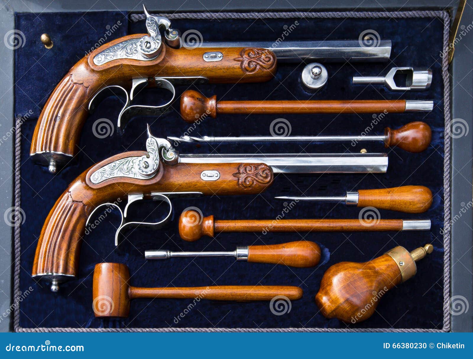 Ancient guns in a box. stock photo. Image of collection - 66380230