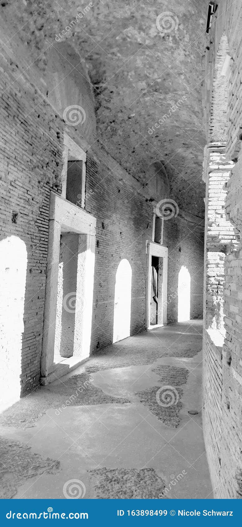 Ancient hallway in Rome stock image. Image of monochromatic - 163898499