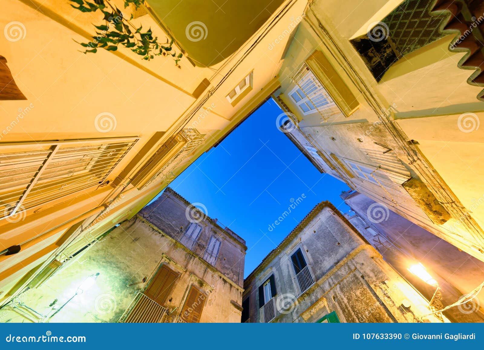 Ancient Homes of Tropea, Skyward View from the Street at Sunset Stock ...