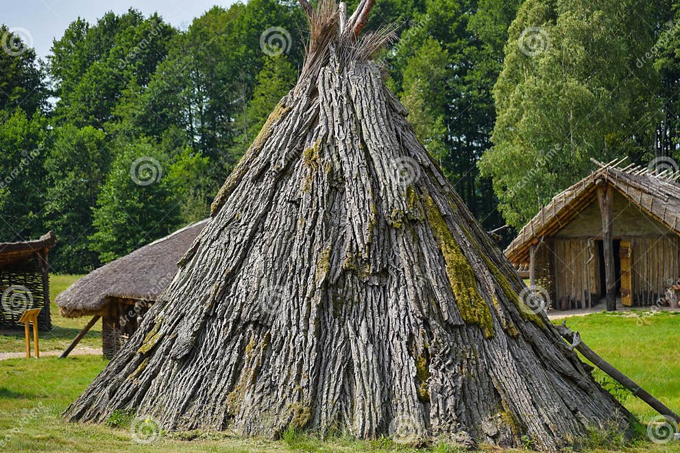 An Ancient Hut Built from Tree Bark Stock Image - Image of grey, jungle ...