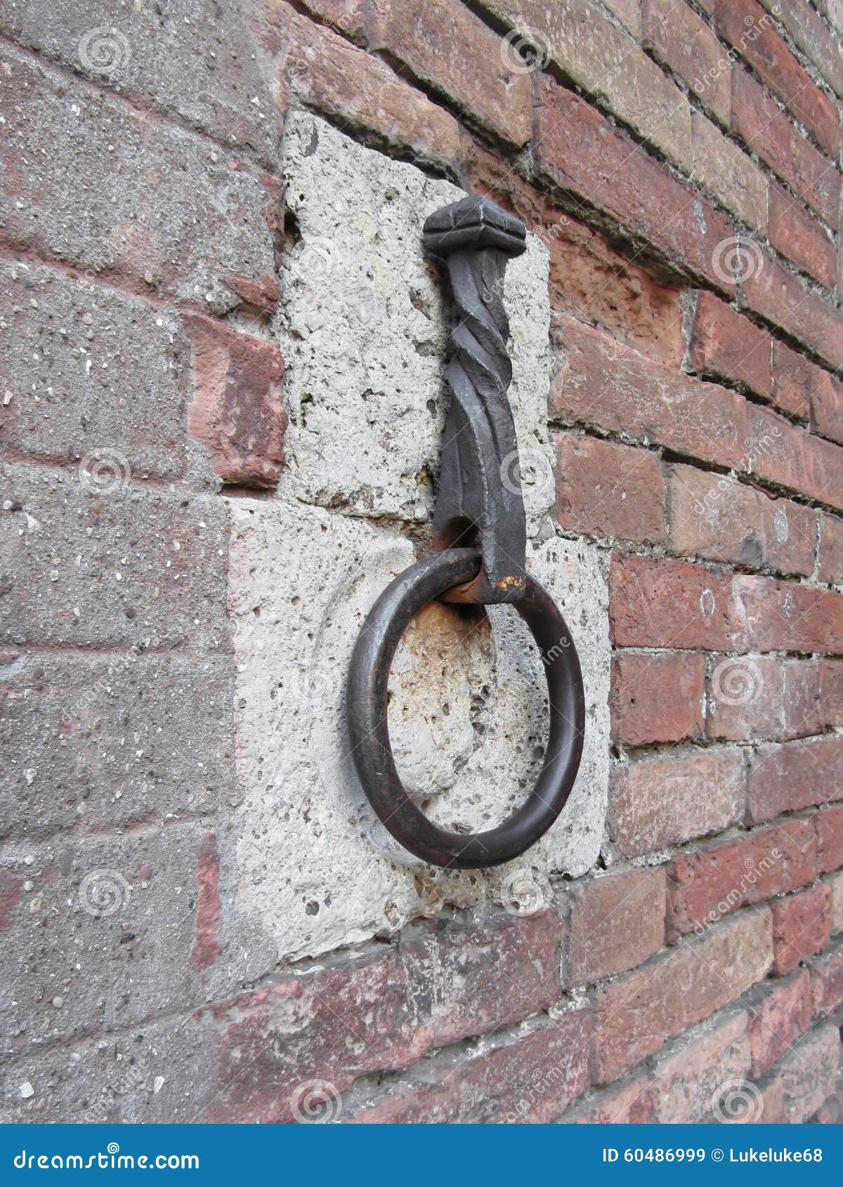 Ancient Iron Hoop Hanging on Stone Wall Stock Image - Image of vintage ...