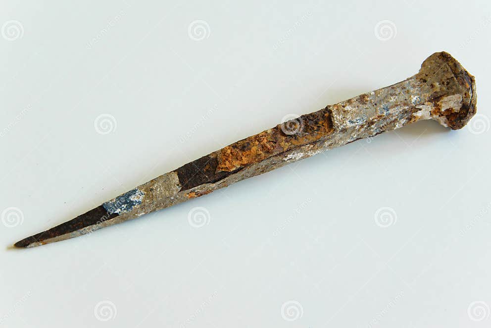 An Ancient Iron Nail on White Background Stock Image - Image of ...