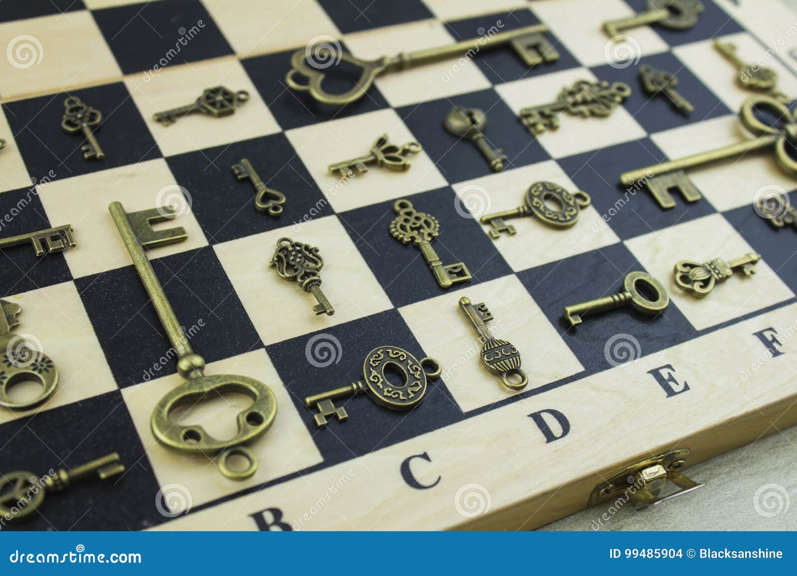 Ancient Keys on a Chessboard Stock Photo - Image of lock, concept: 99485904