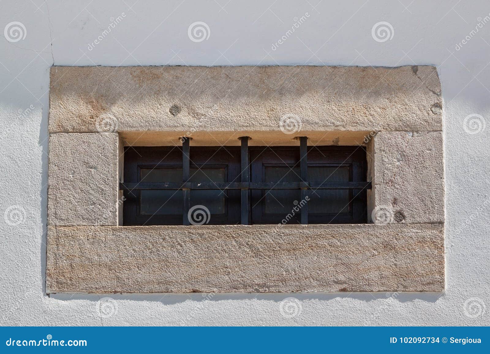 An Ancient Lattice of a Prison Window. Thick Wall. Stock Photo - Image ...