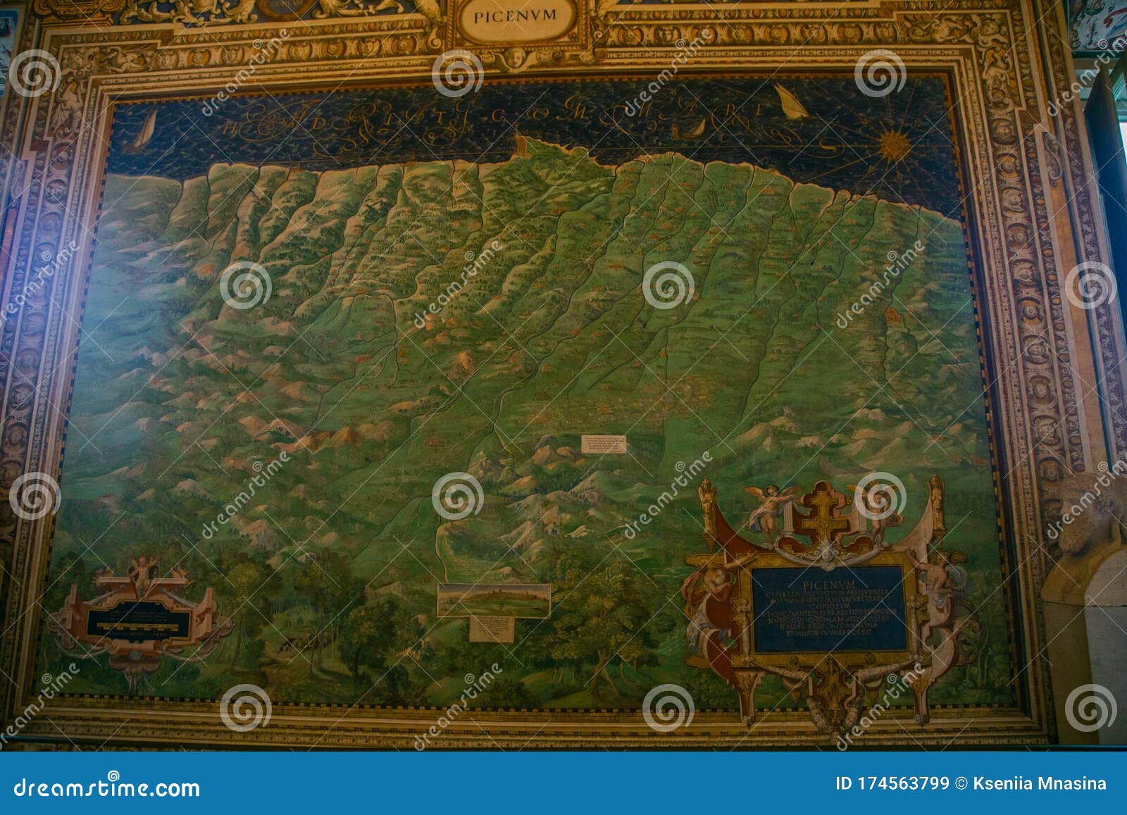 An Ancient Map in a Gold Frame Depicting the Surface of the Earth ...