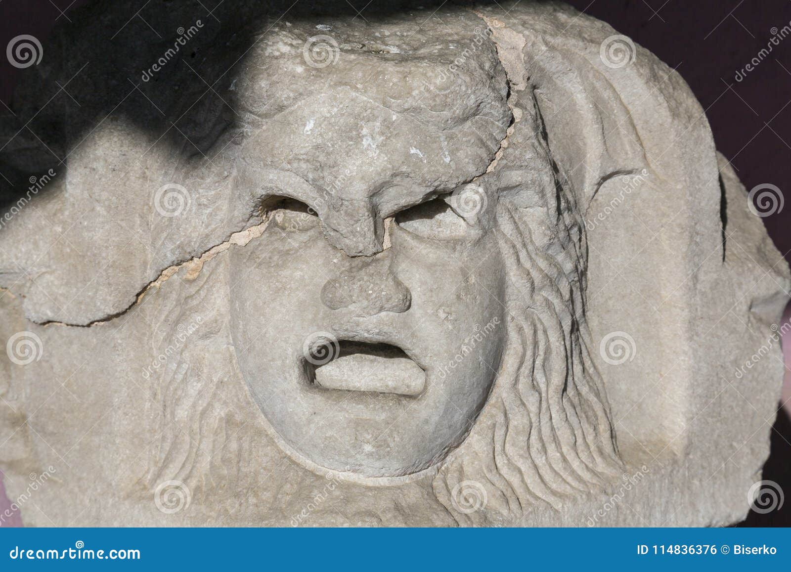 Ancient mask in stone stock photo. Image of stone, detail - 114836376