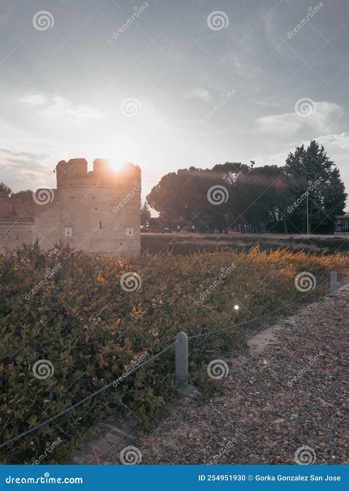 Ancient Medieval Castle with Moat in Front at Sunset with the Sun ...