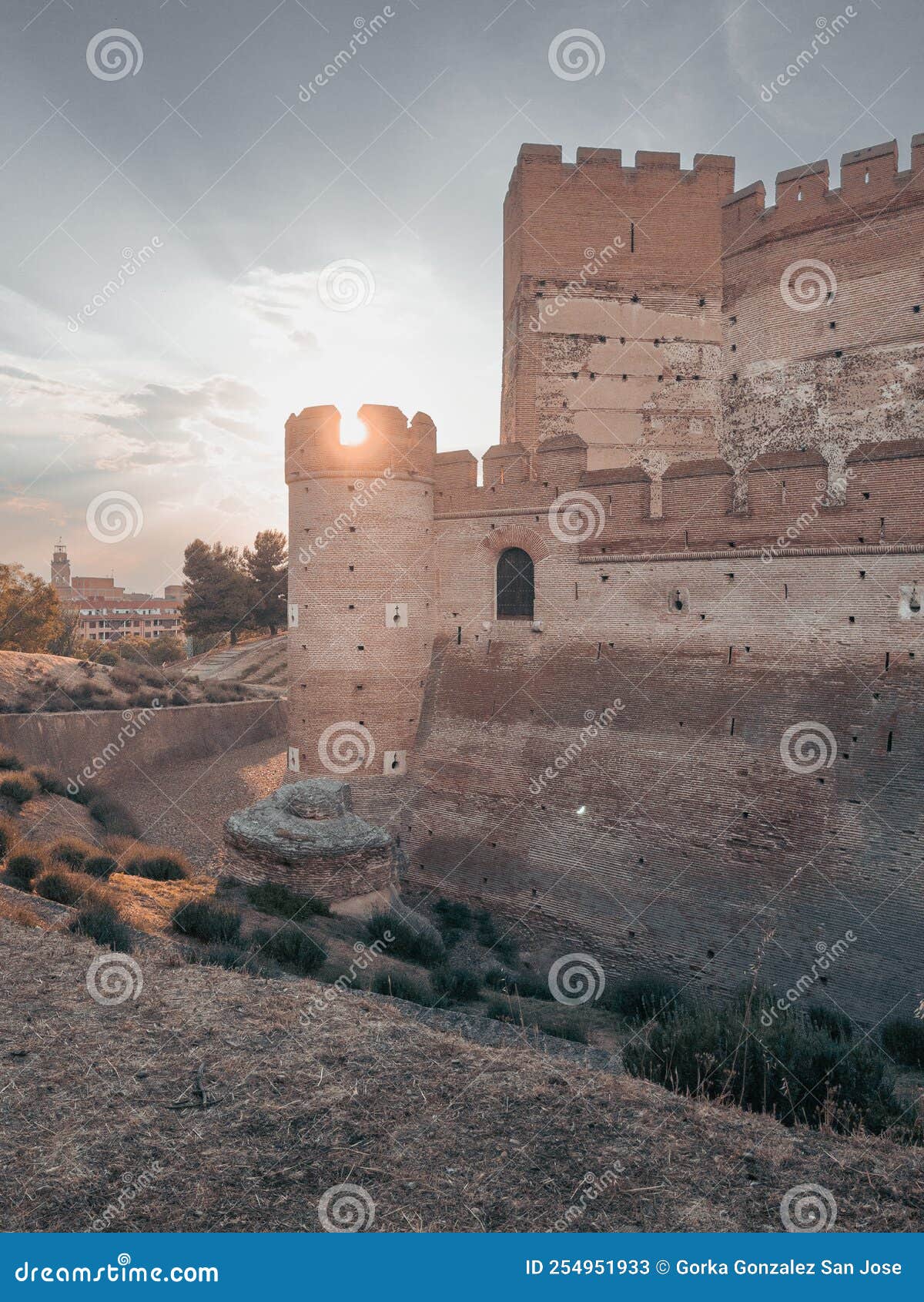 Ancient Medieval Castle with Moat in Front at Sunset with the Sun ...