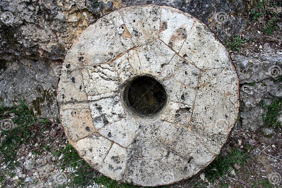 Ancient millstone stock image. Image of front, millstone - 8774361