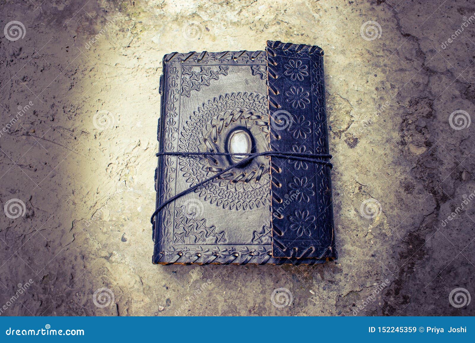 Ancient Old Leather Bound Book Lying on the Ground Stock Image - Image ...