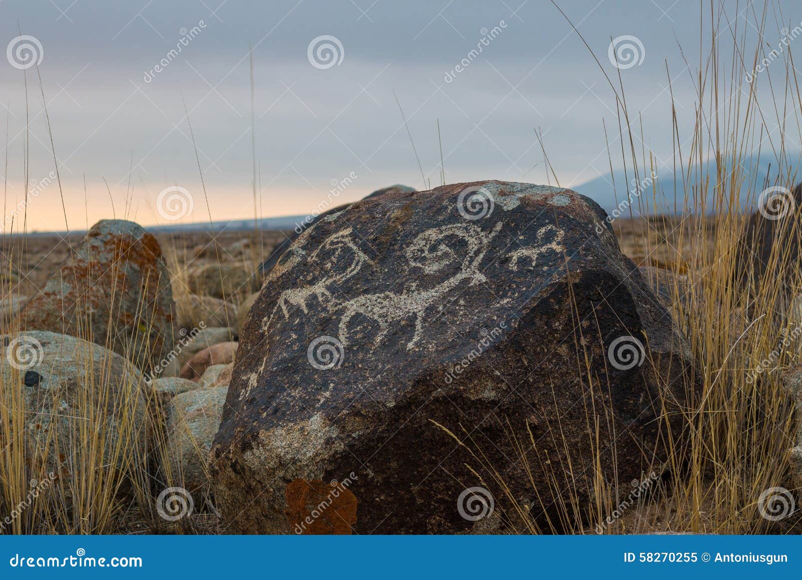 Ancient petroglyph stock image. Image of heritage, boulder - 58270255