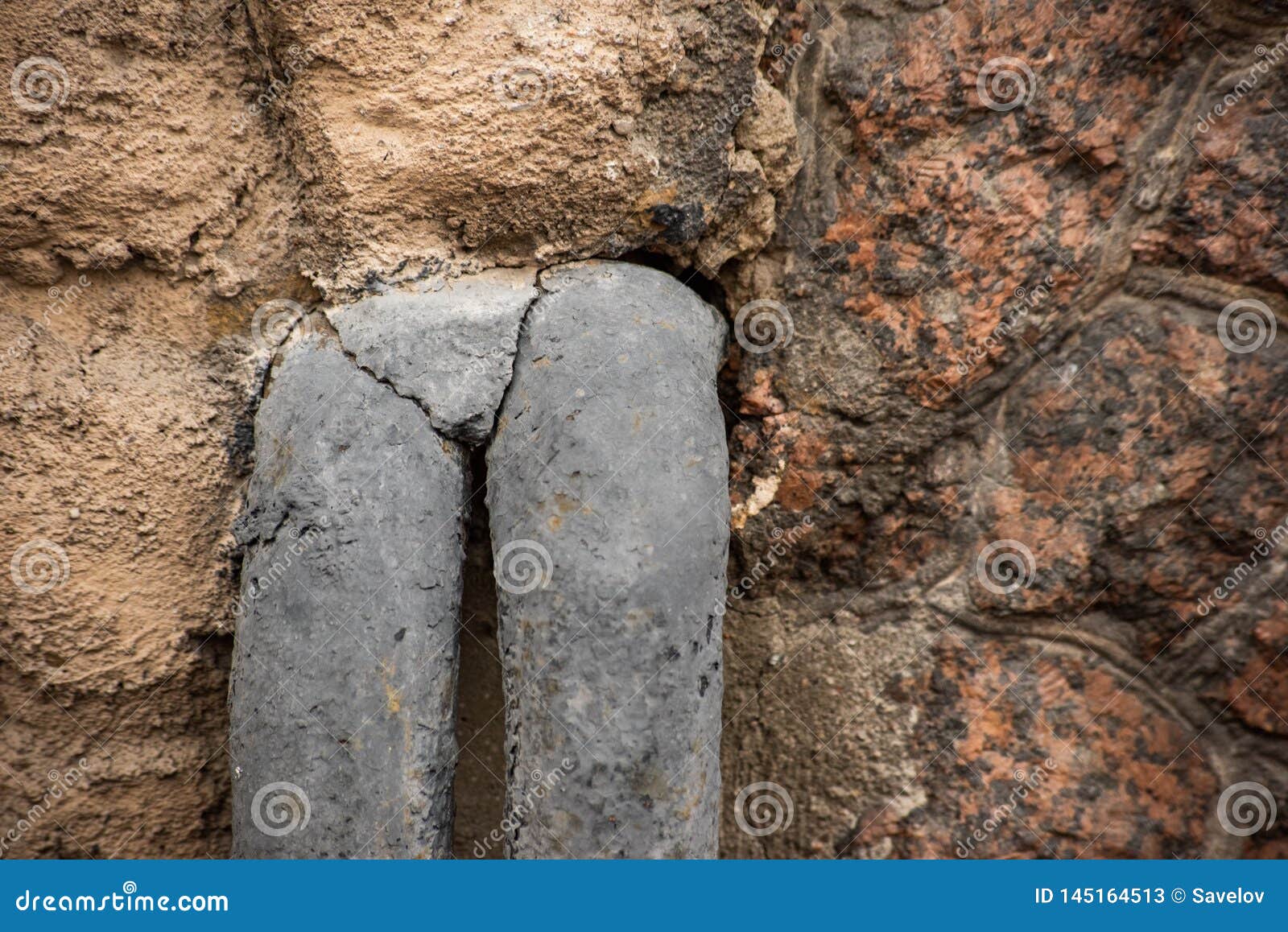 Ancient Pipe in a Stone Wall Stock Image - Image of ancient, metal ...