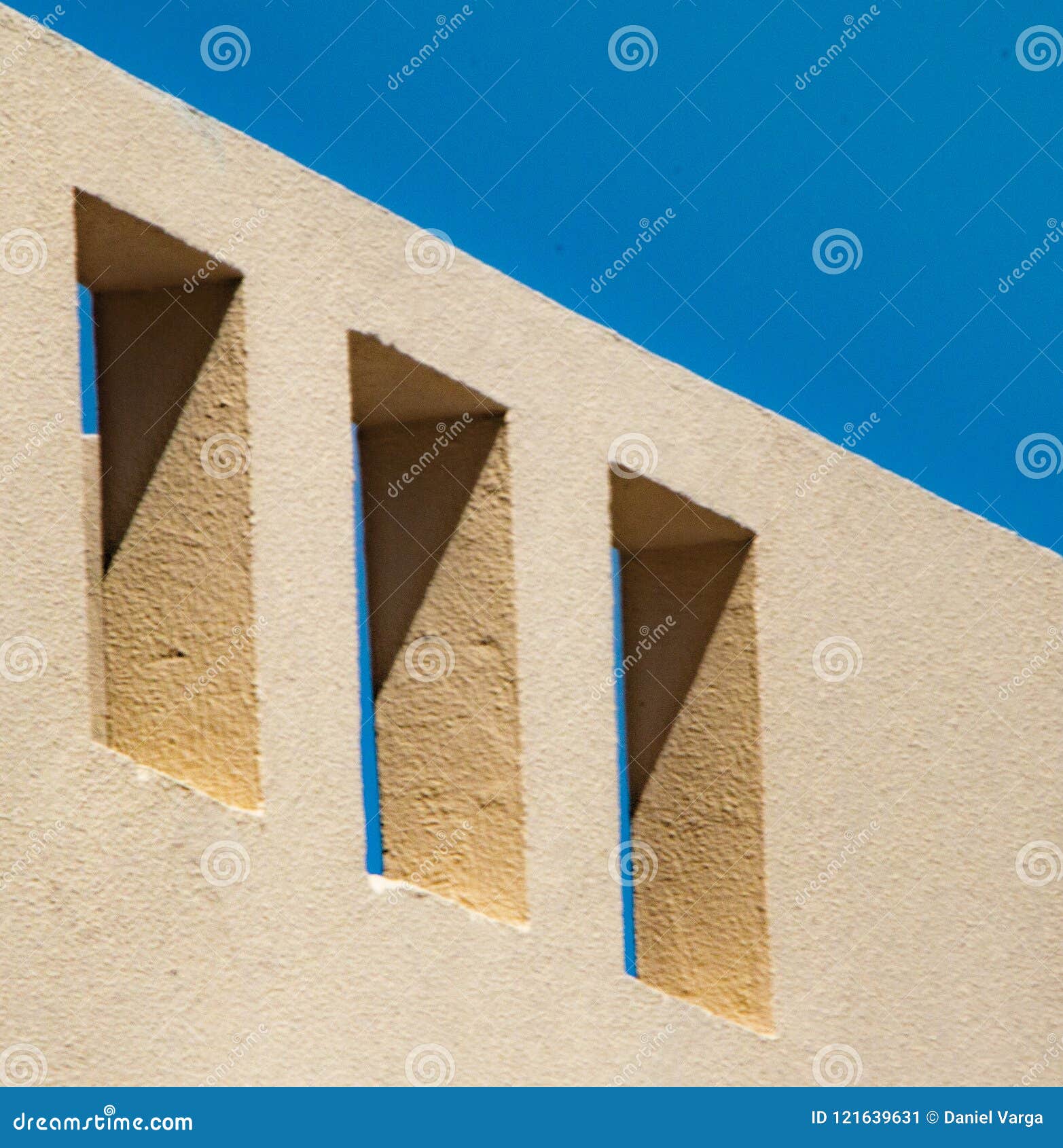 Ancient Primitive Beige Stone Wall with a Blue Sky Stock Image - Image ...