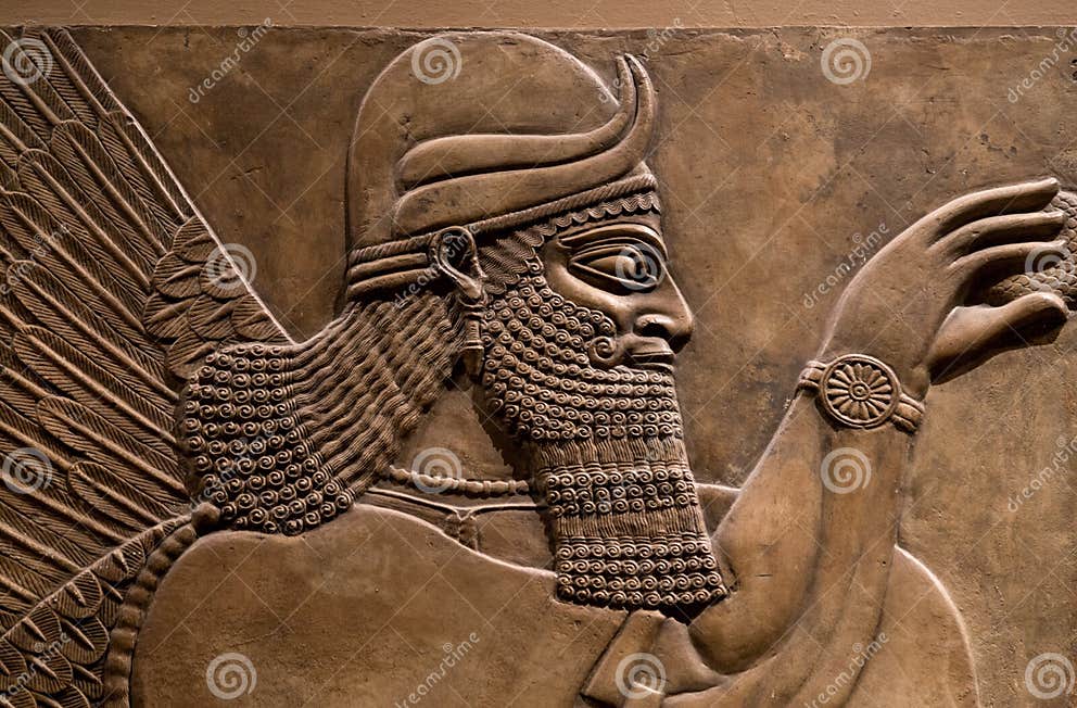 Ancient Relief of an Assyrian God Stock Photo - Image of ancient ...