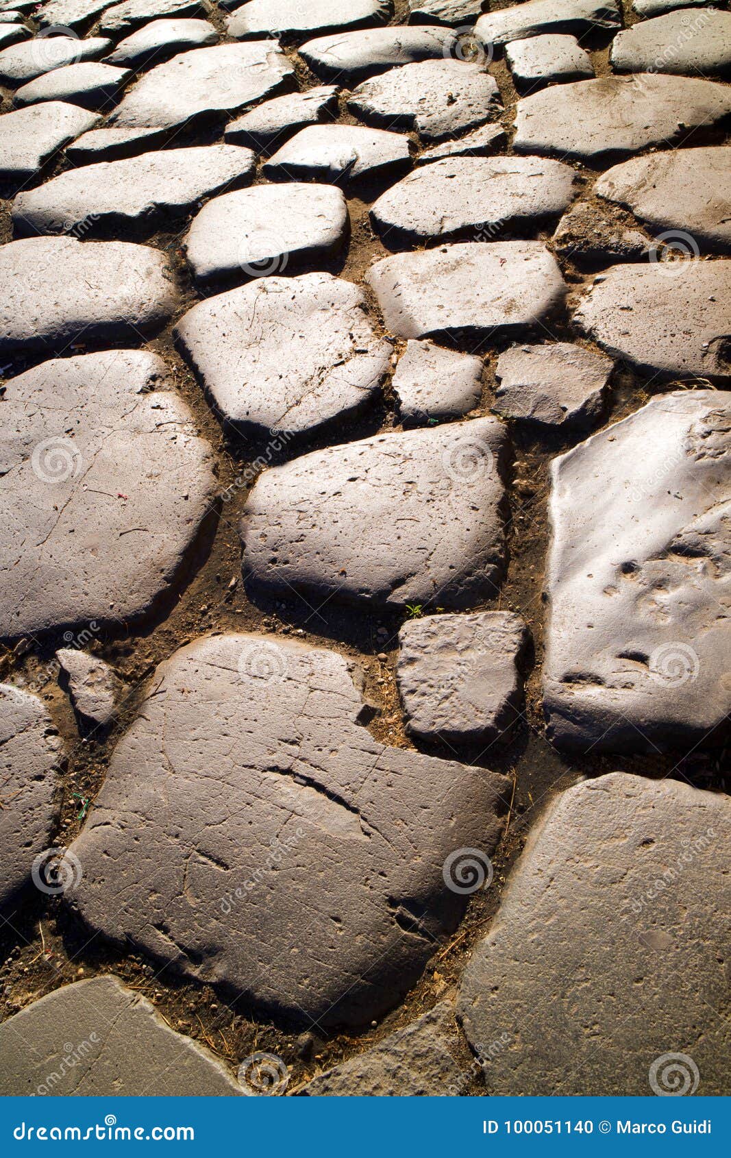 Ancient road of stones stock photo. Image of stone, dark - 100051140