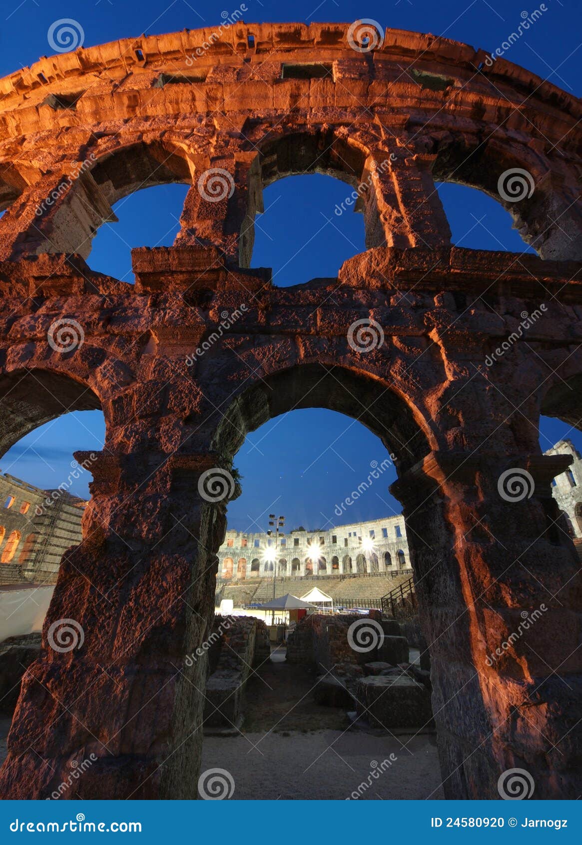 Ancient Roman Amphitheater at Dusk Stock Photo - Image of landmark ...