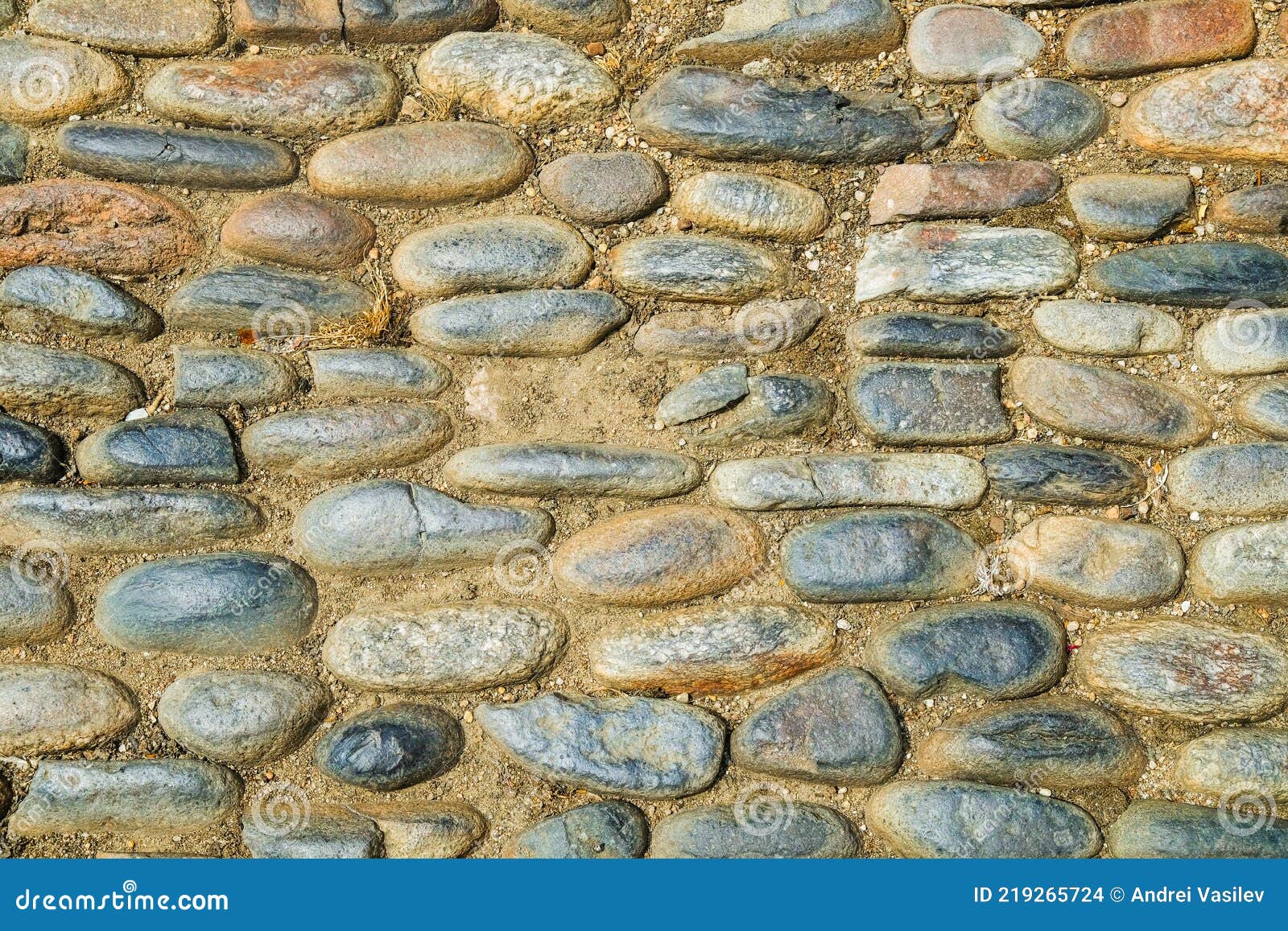 Ancient Roman Road Surface Paved by Cobblestone, Spain. Background and ...