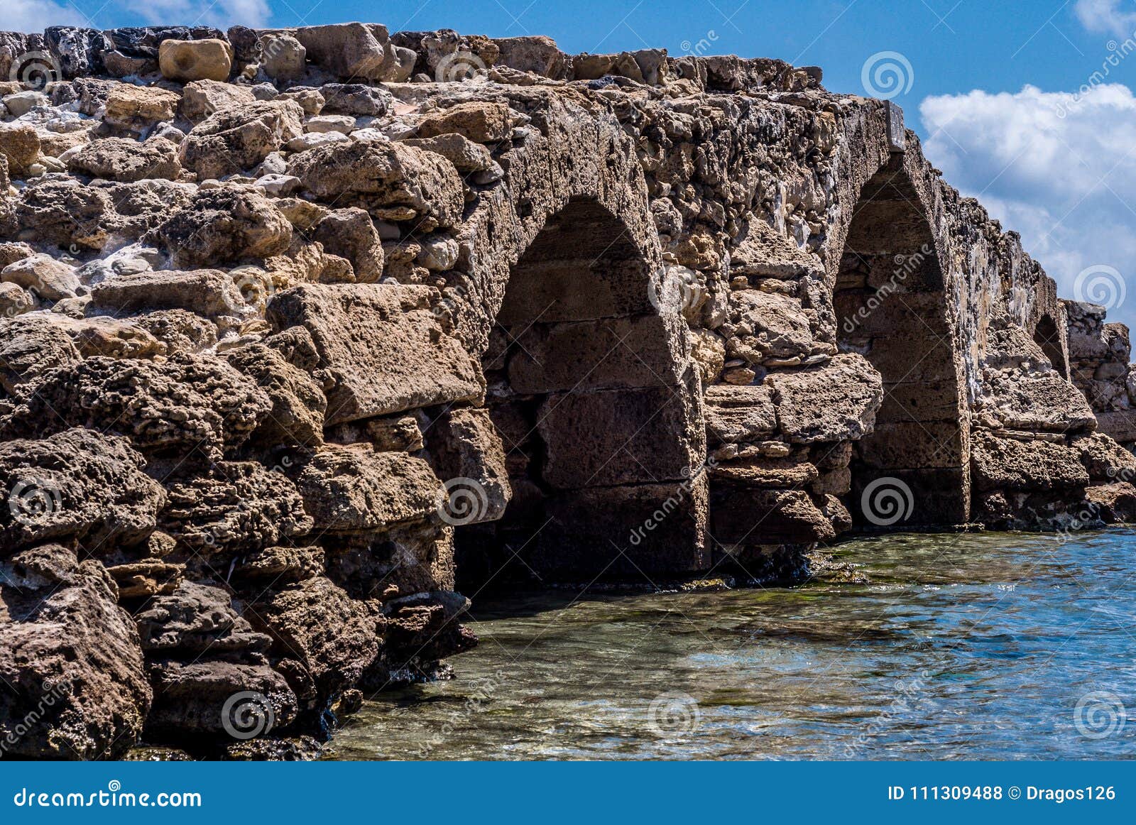 Stone arch bridge on water stock photo. Image of nature - 111309488