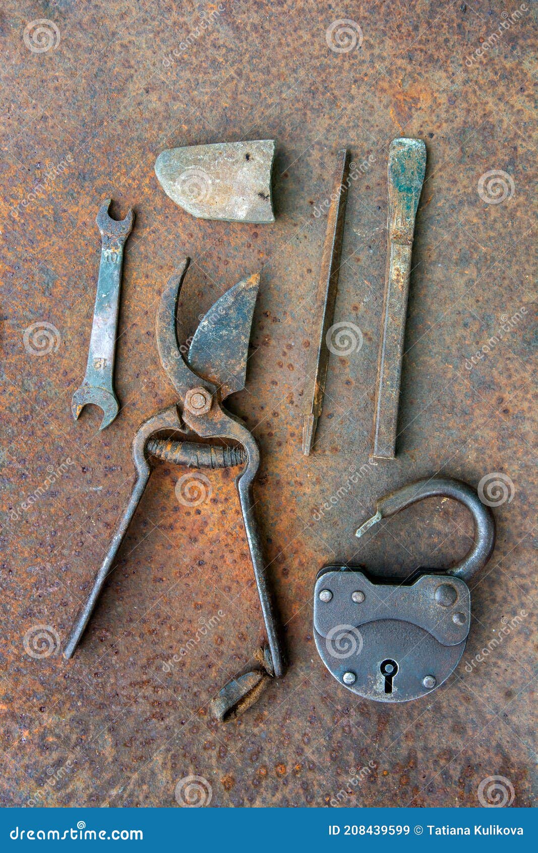 Ancient Rusty Tools on a Metal Surface. Steampunk Style Stock Image ...