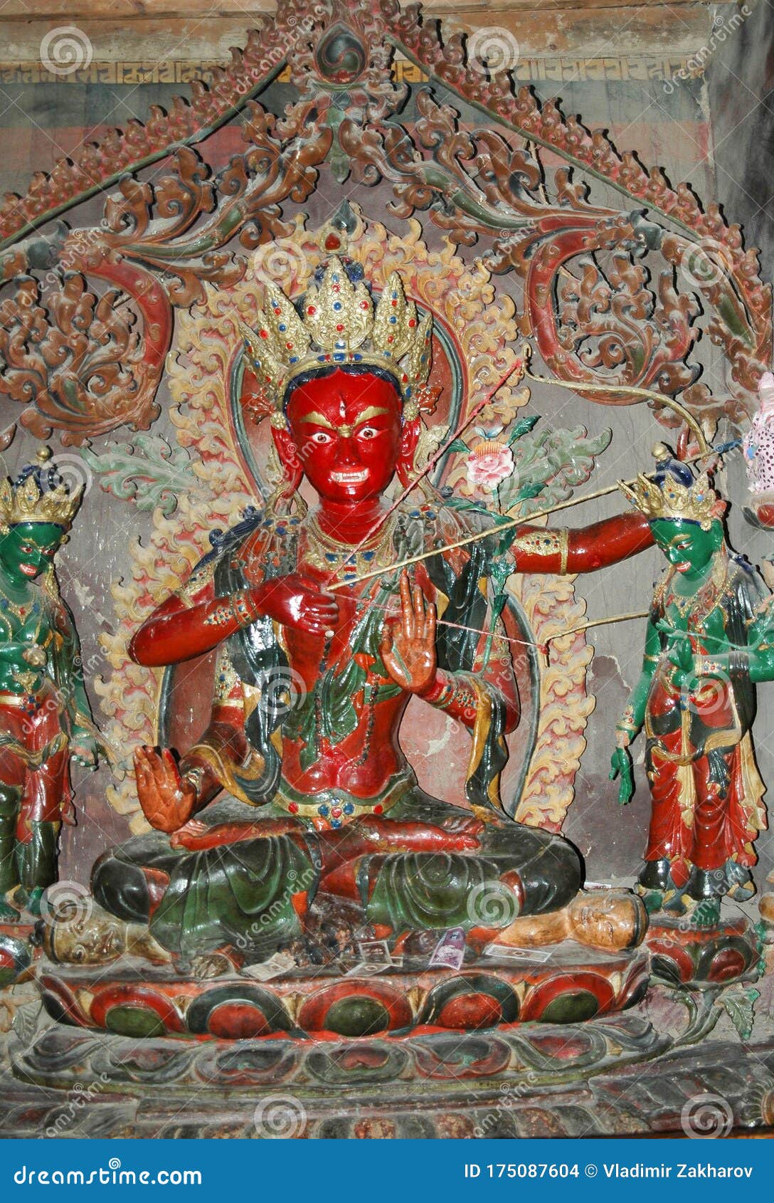 An Ancient Sacred Statue of a Red Deity with a Stretched Bowstring of a ...