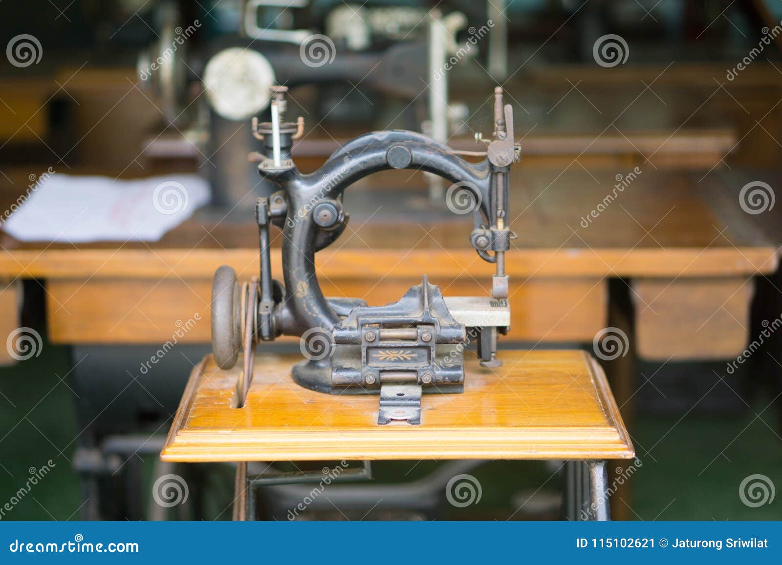 Ancient Sewing Machine on the Table. Editorial Photo - Image of ...