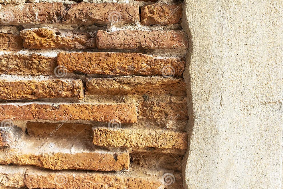 An Ancient Square Stone Wall with Light Brown Plaster Stock Image ...