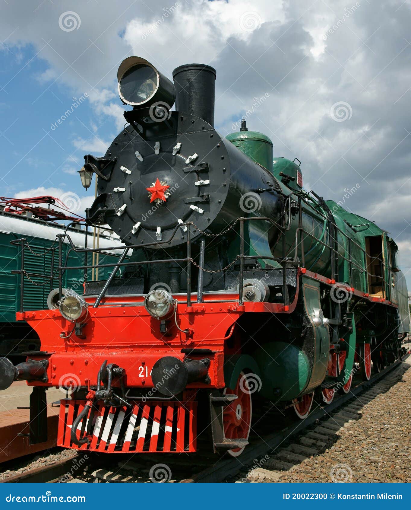 Ancient Steam Locomotive In Steam. Live Steam Around Mechanical Stock ...