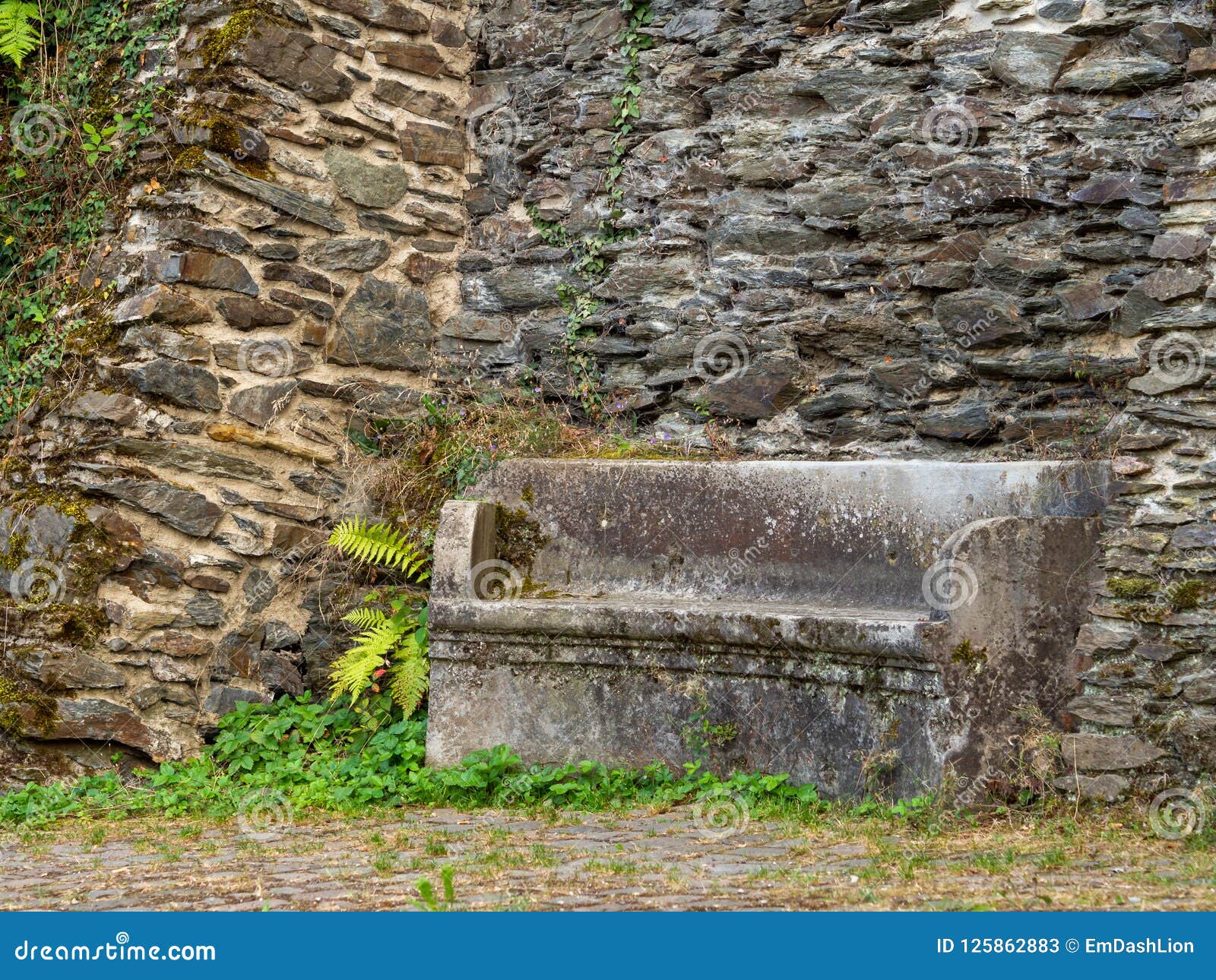 Ancient Stone Bench Along a Castle Wall Stock Image - Image of seat ...