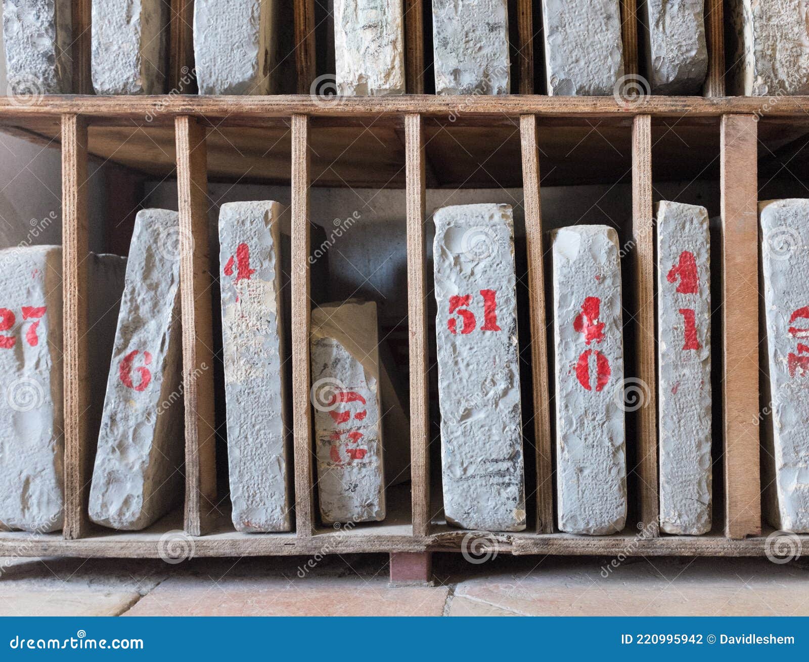 Ancient Stone Books on Bookshelves. Education and Knowledge Stock Photo ...