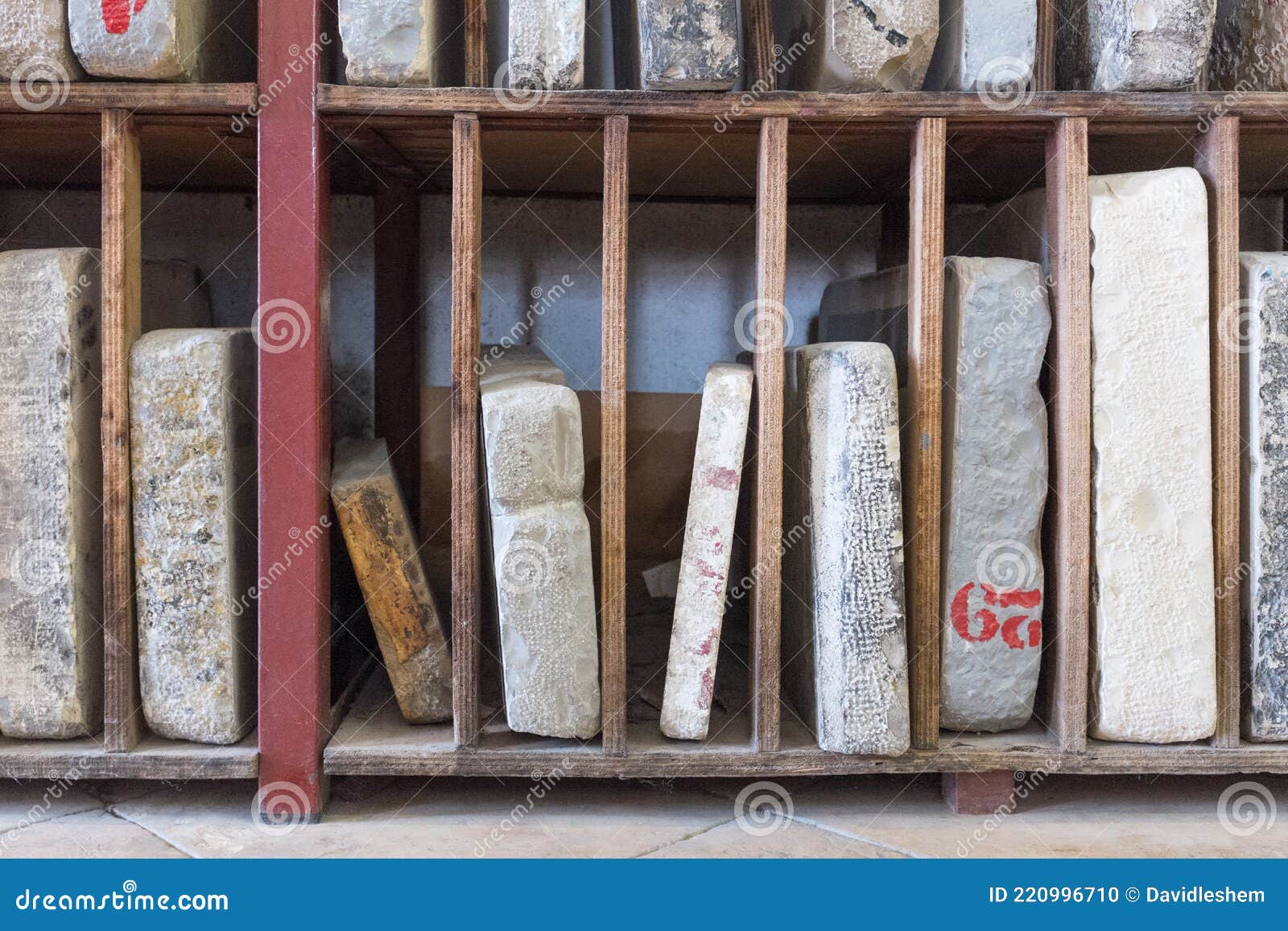 Ancient Stone Books on Bookshelves. Education and Knowledge Stock Photo ...