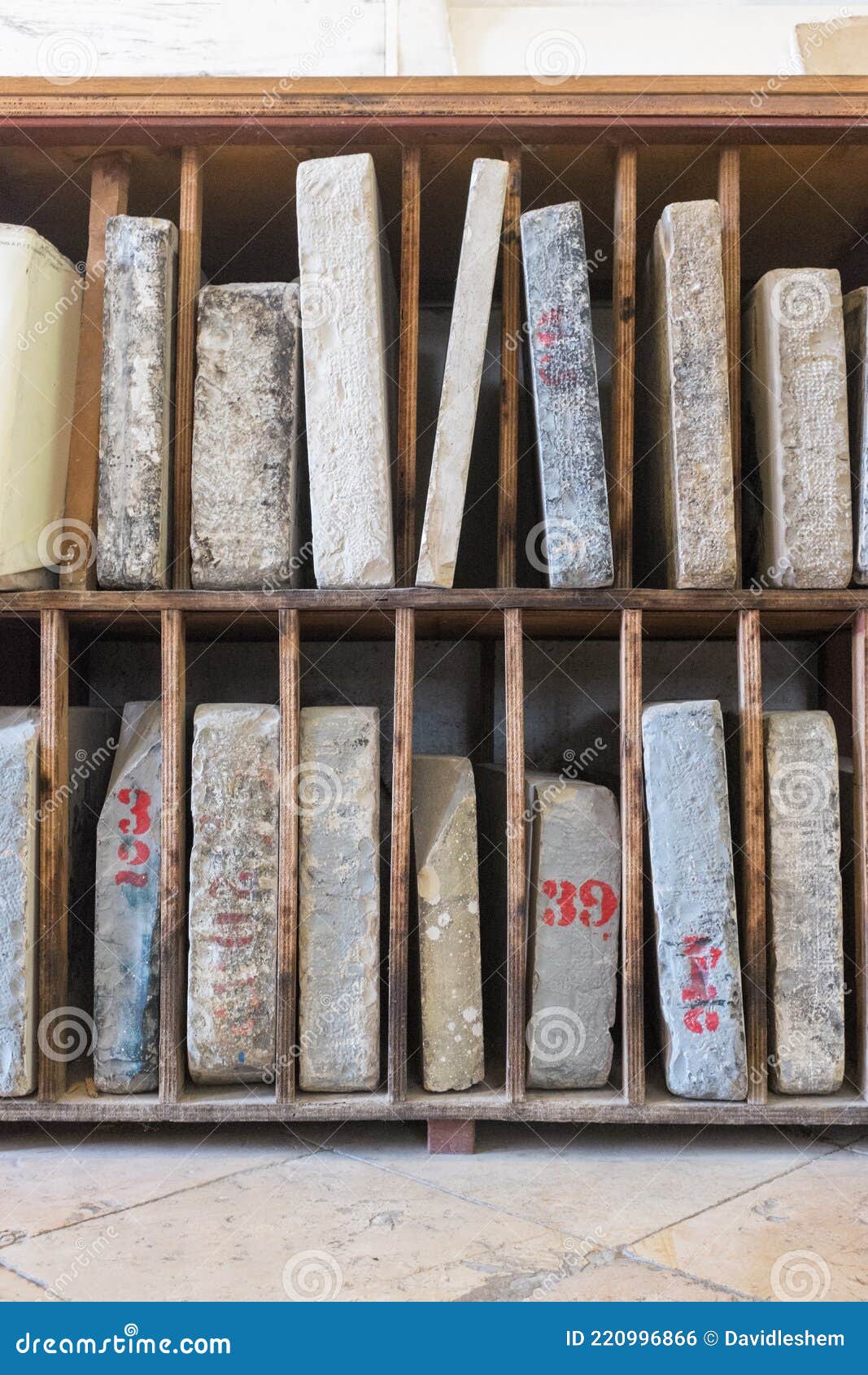 Ancient Stone Books on Bookshelves. Education and Knowledge Stock Photo ...