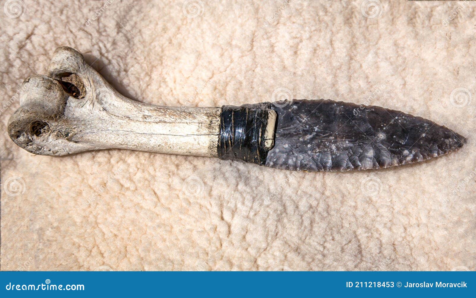 Ancient Stone Dagger. Historical Knife with Bone Handle Stock Image ...