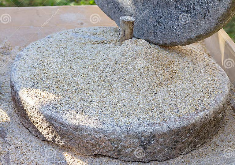 The Ancient Stone Hand Grain Mill Stock Photo - Image of natural ...