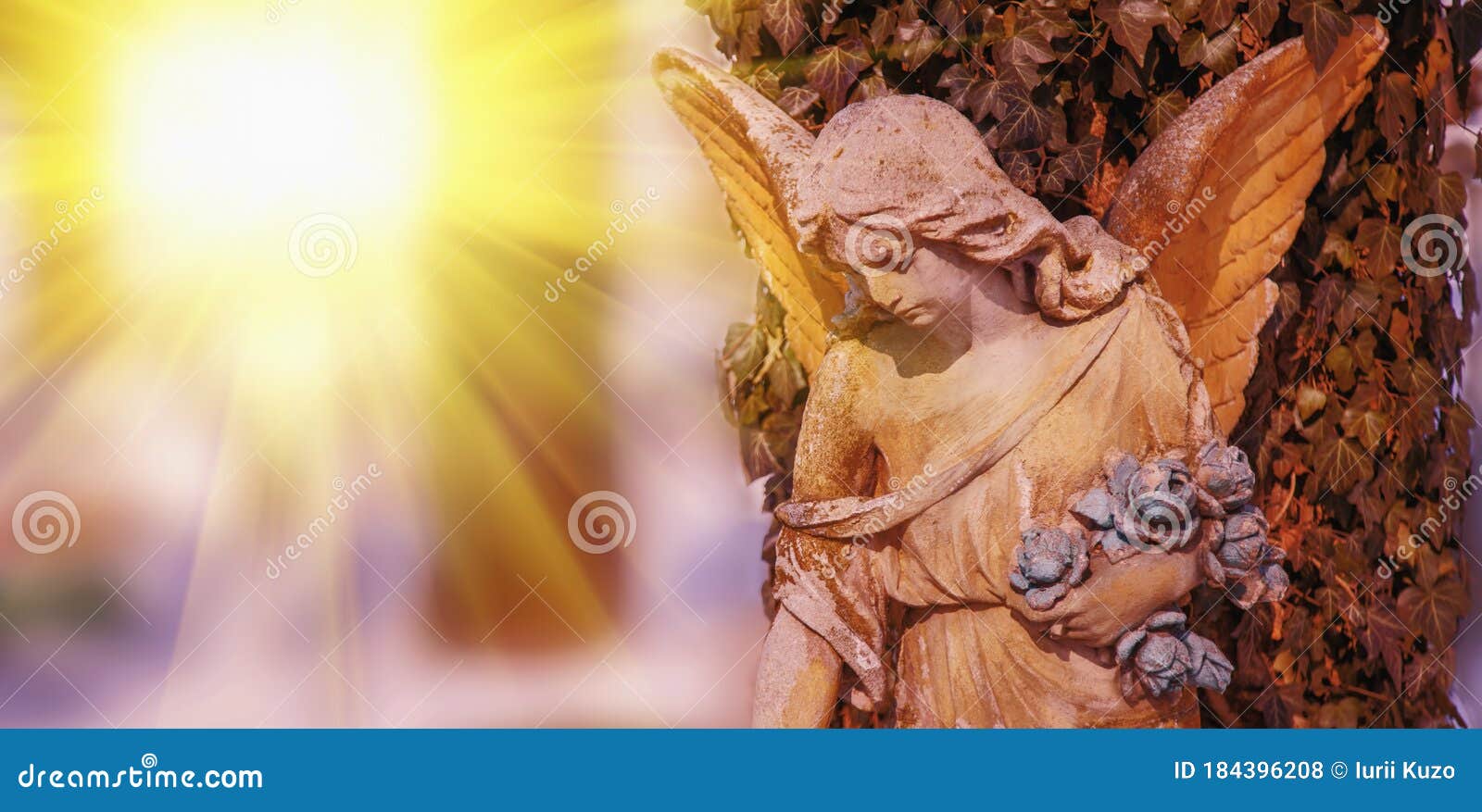 An Ancient Stone Statue of Guardian Angel with Wings Stock Photo ...