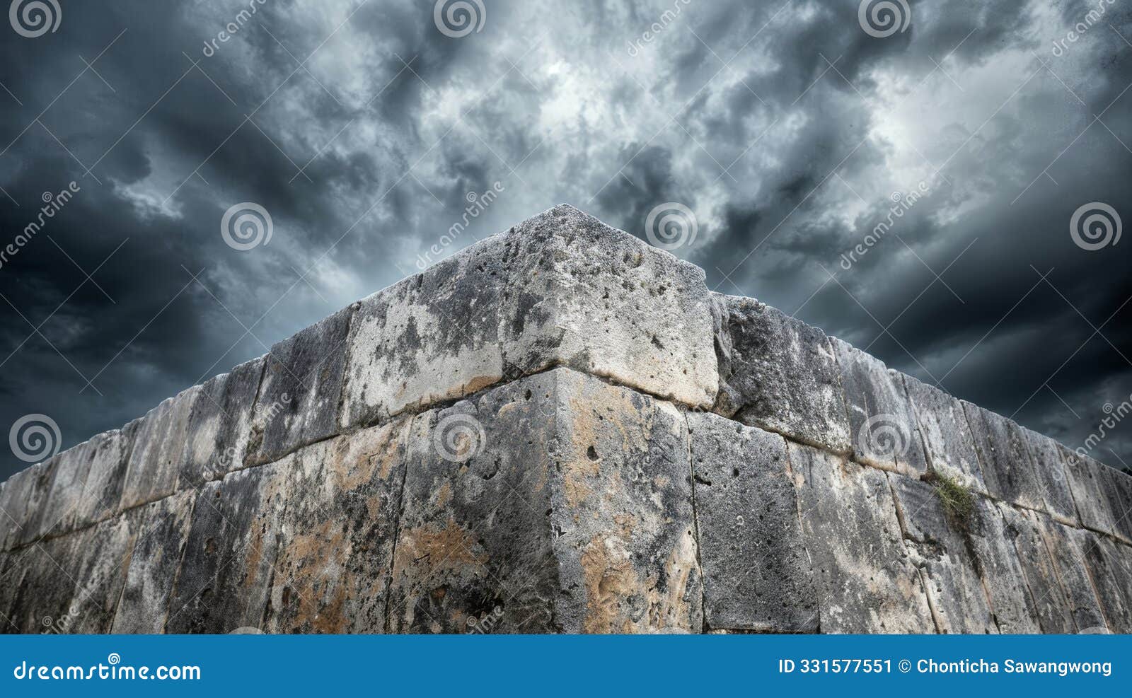 Ancient Stone Structure Against Dramatic, Cloudy Sky, Representing ...