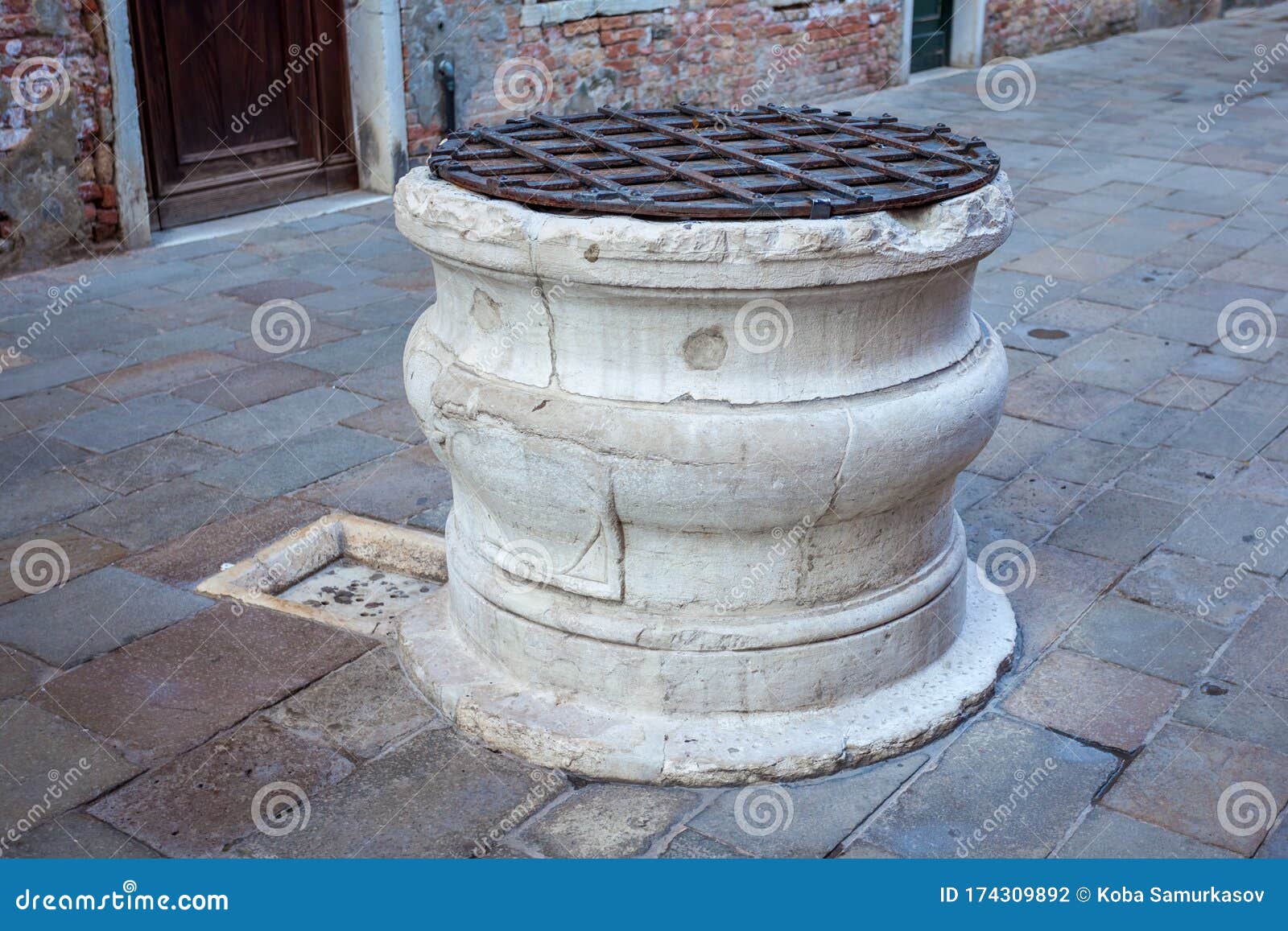 Ancient Stone Well for Rain Water in a Square in Venice Stock Photo ...