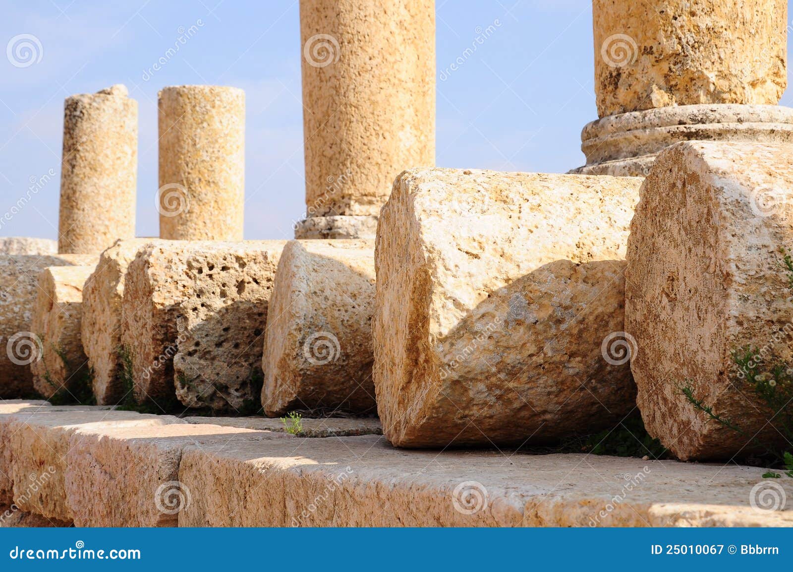 Ancient stones and columns stock image. Image of archaeological - 25010067