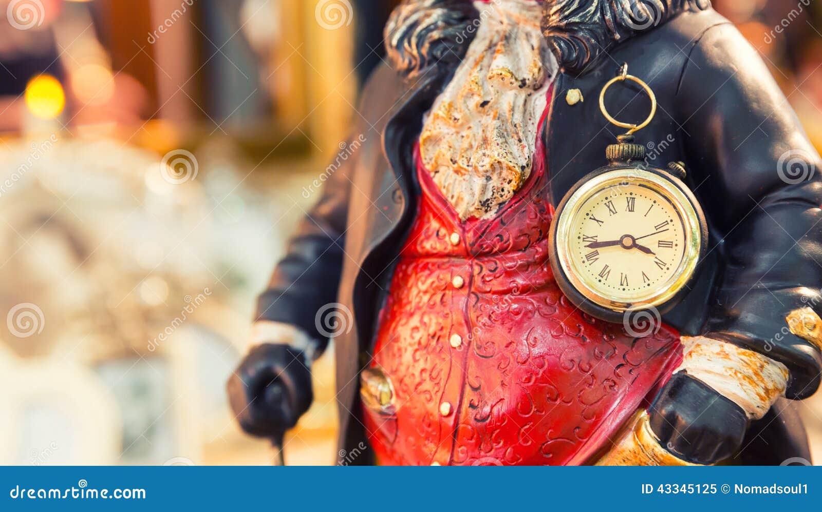 Ancient Style Clock on the Statuette of Man Stock Image - Image of cast ...
