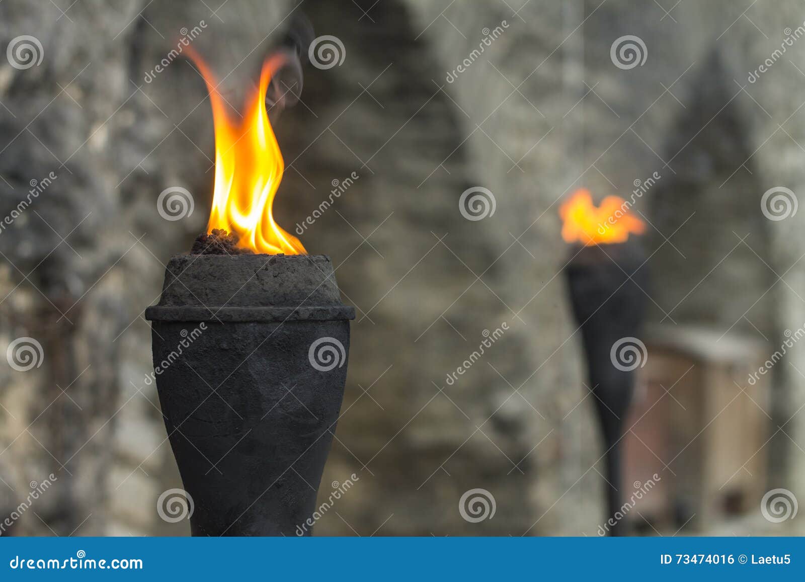Ancient Wall Highlighted by Pair of Iron Torch in Tallinn Old Town ...