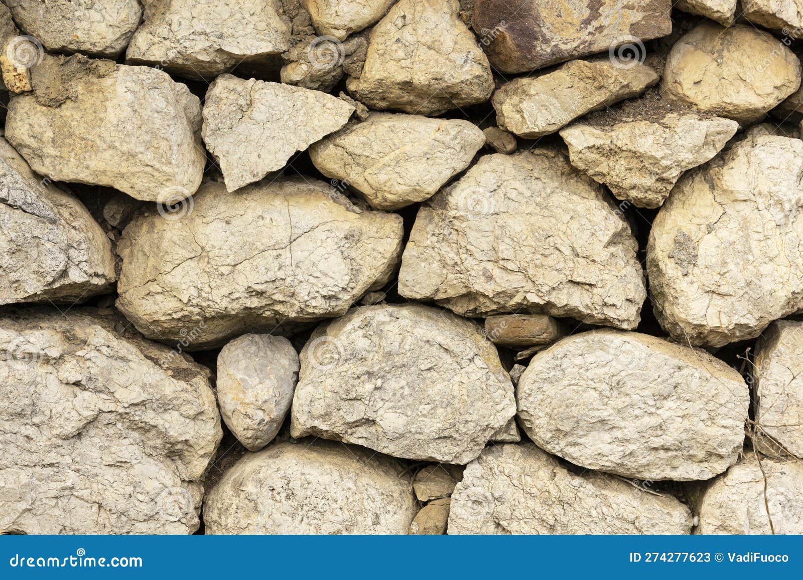An Ancient Wall of Stacked Stone. Background Stock Image - Image of ...