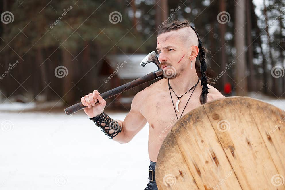 Ancient Warrior with a Pigtail with an Ax and a Shield Stock Image ...